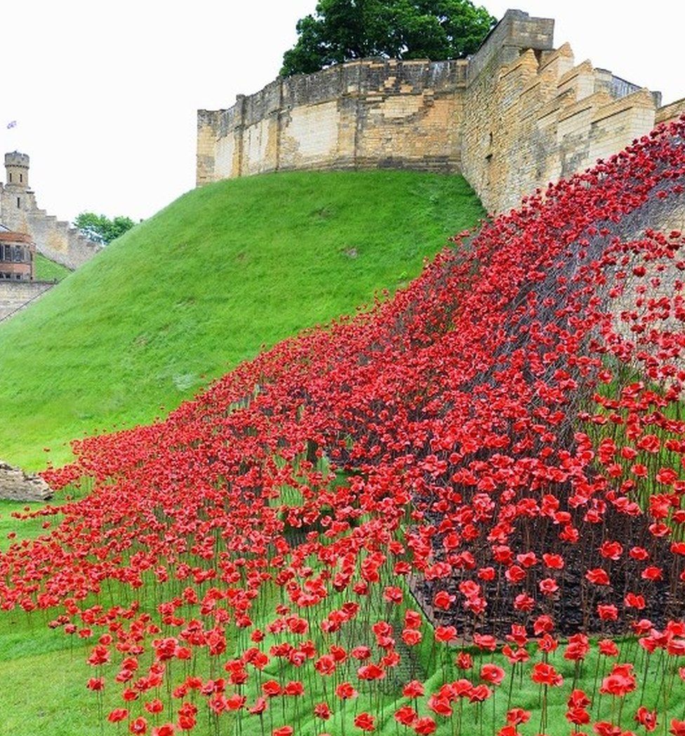 Tower of London poppies attract 500,000 to Lincoln Castle - BBC News