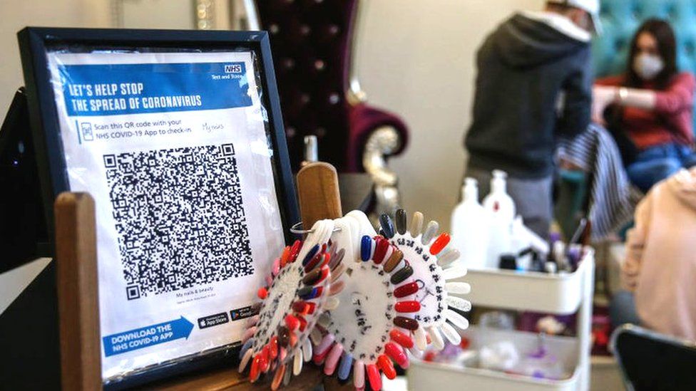 Man arrested for faking Covid-19 check-in QR codes - BBC News