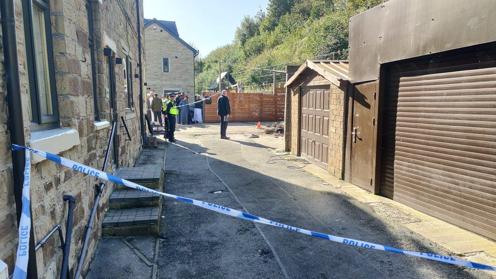 Batley wall collapse kills one man and injures another - BBC News