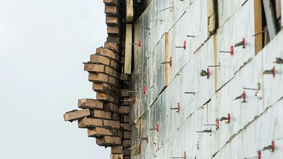 School wall collapse linked to 'design issue' - BBC News