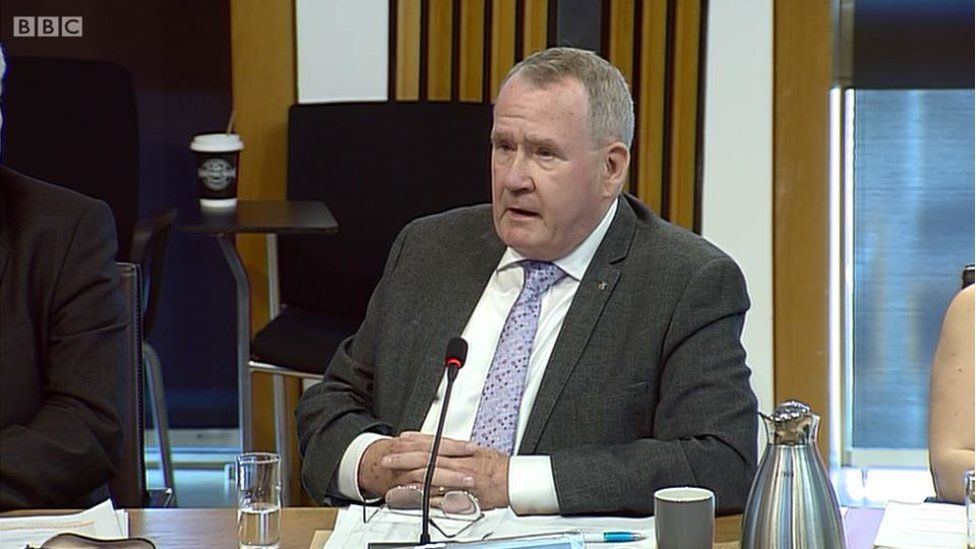 MSPs back plans for tax on workplace car parking spaces - BBC News