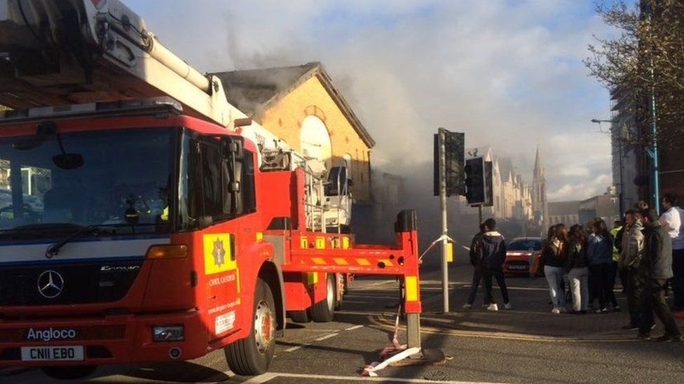 Roof collapse as fire engulfs furniture shop on City Road, Cardiff ...