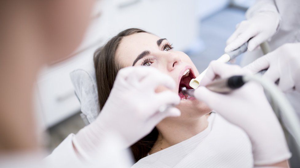 Covid: Tooth loss fears over dentist check-up delays - BBC News