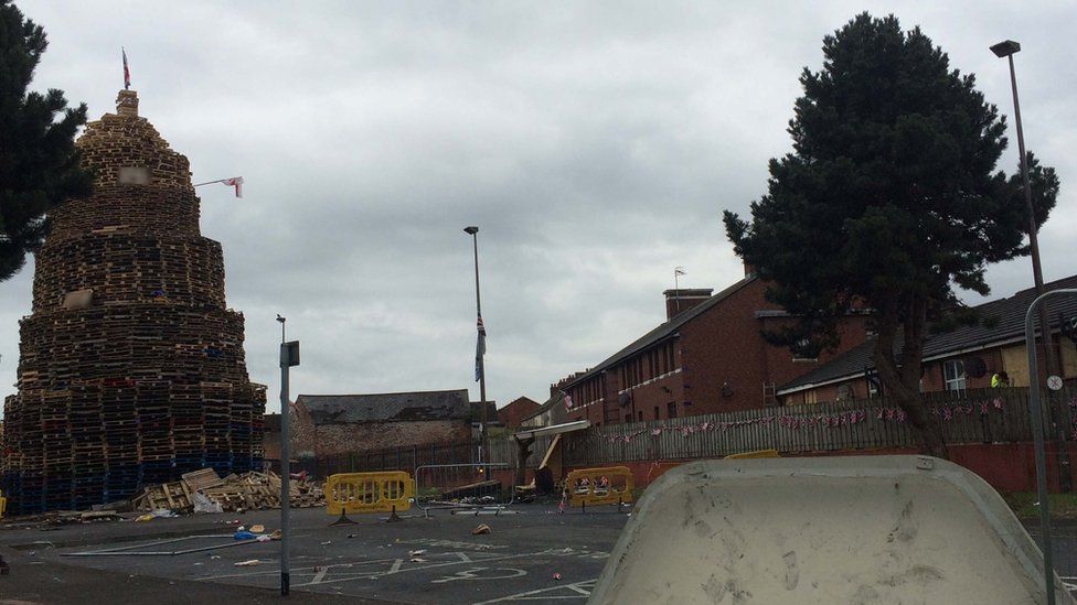 Belfast homes boarded up ahead of Eleventh Night bonfire - BBC News
