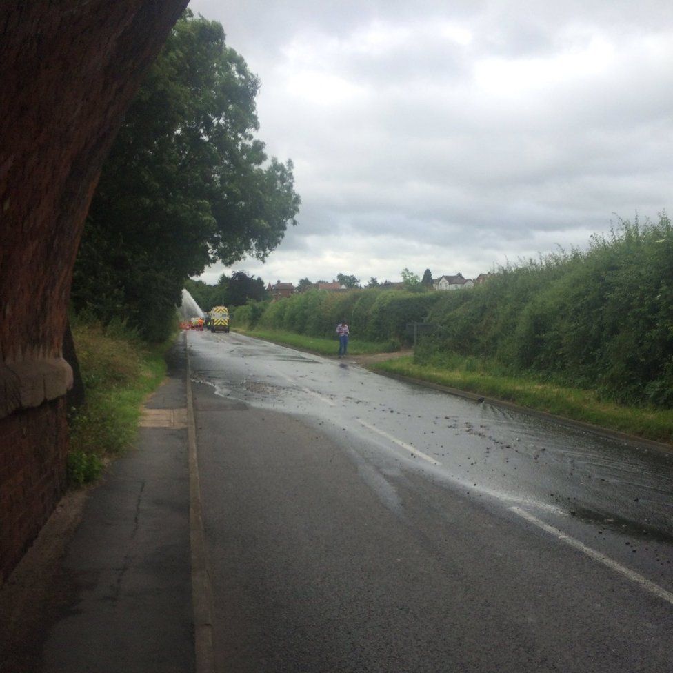 Water pipe burst blasts hole in road in Plumtree - BBC News