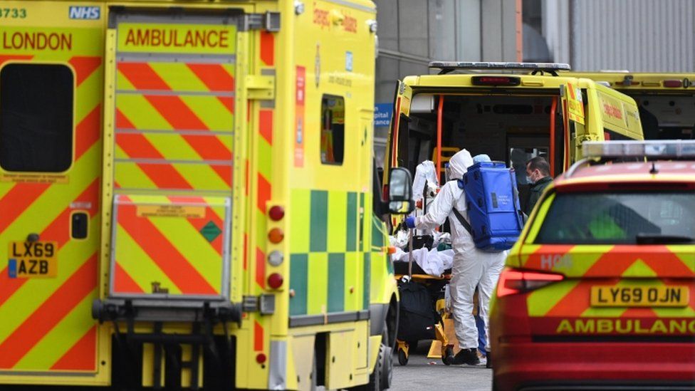 Covid: Hospitals 'stable' but 'another hard year ahead' - BBC News