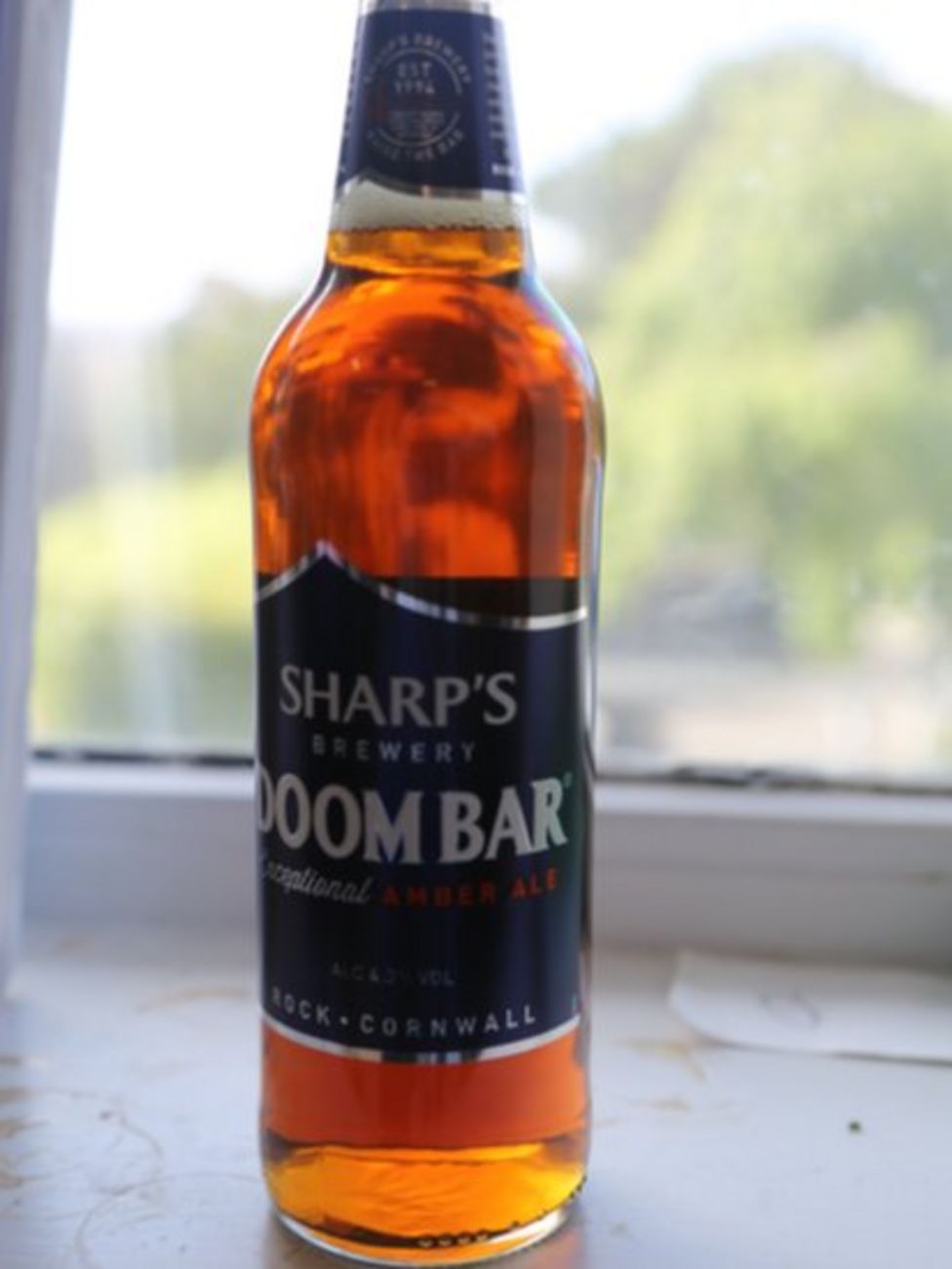 Best-selling bottled ale Doom Bar not brewed in Cornwall - BBC News