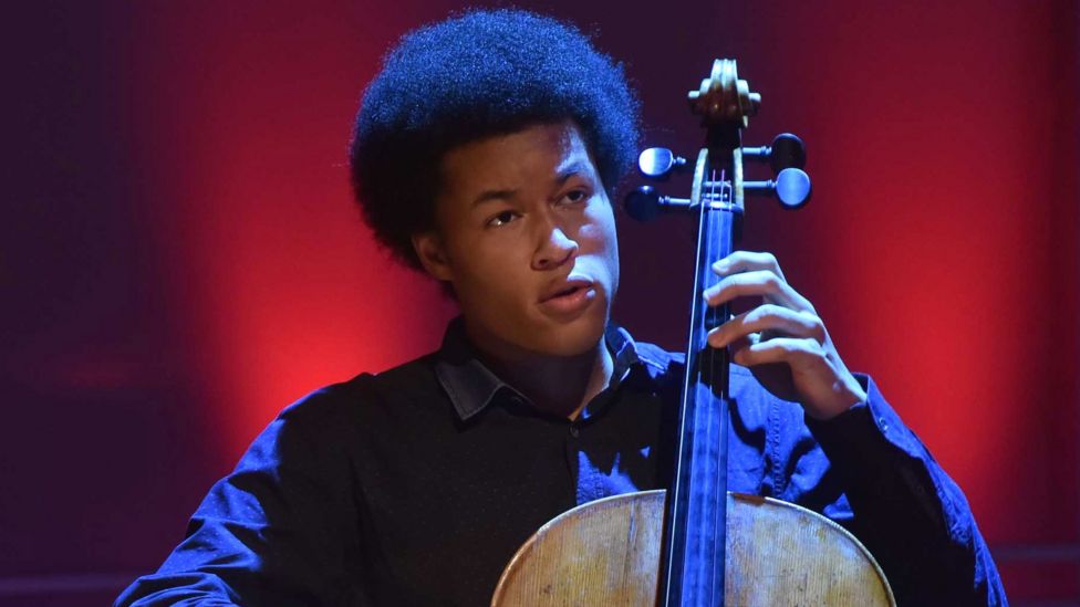 Cellist Sheku Kanneh-Mason receives MBE honour at Windsor Castle - BBC News