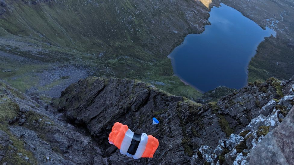 Base jumper 'lucky' to survive hitting rock face on An Teallach - BBC News