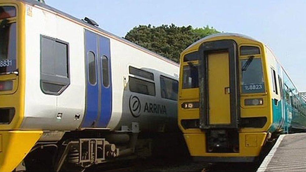 Arriva Trains Wales drivers walk out in pay dispute - BBC News