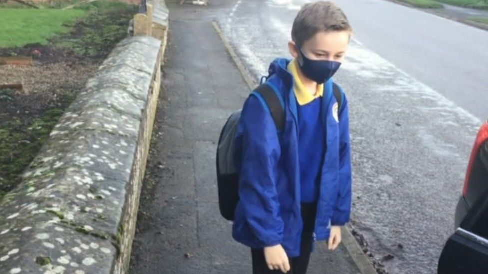 Friskney boy, 10, returns to school after mask row - BBC News