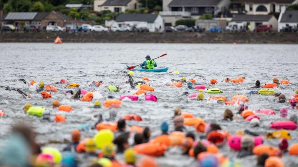 In pictures: The Highlands' Kessock Ferry Swim - BBC News