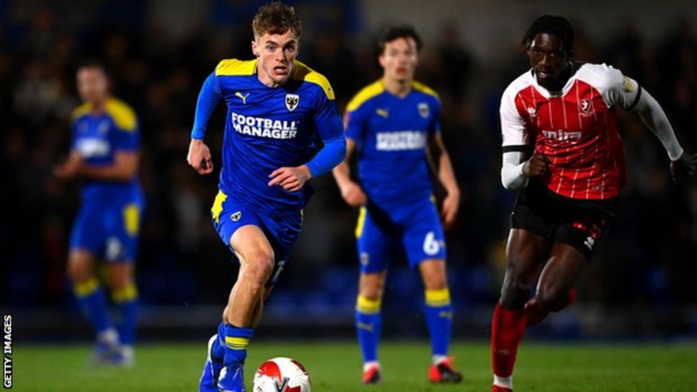 Luke McCormick: Bristol Rovers sign midfielder from AFC Wimbledon - BBC ...