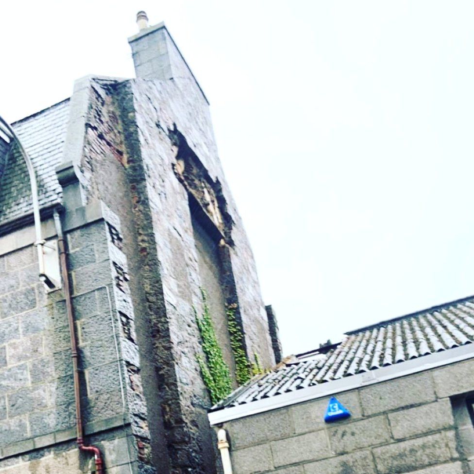 Aberdeen properties evacuated after partial wall collapse - BBC News