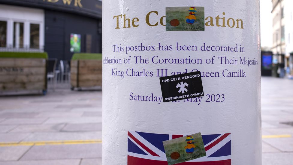 King Charles coronation: Cardiff postbox hit with stickers - BBC News