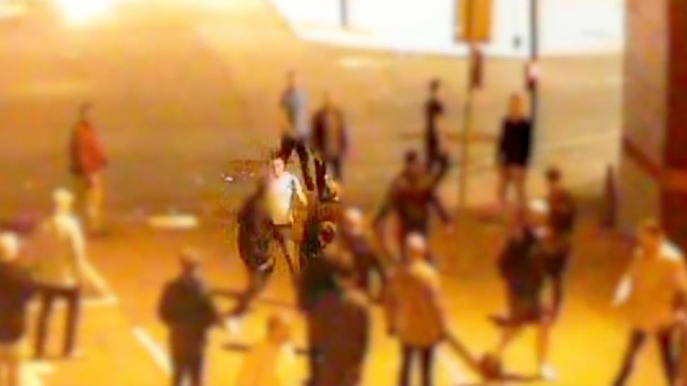 Rival football fans banned from matches after huge brawl - BBC News