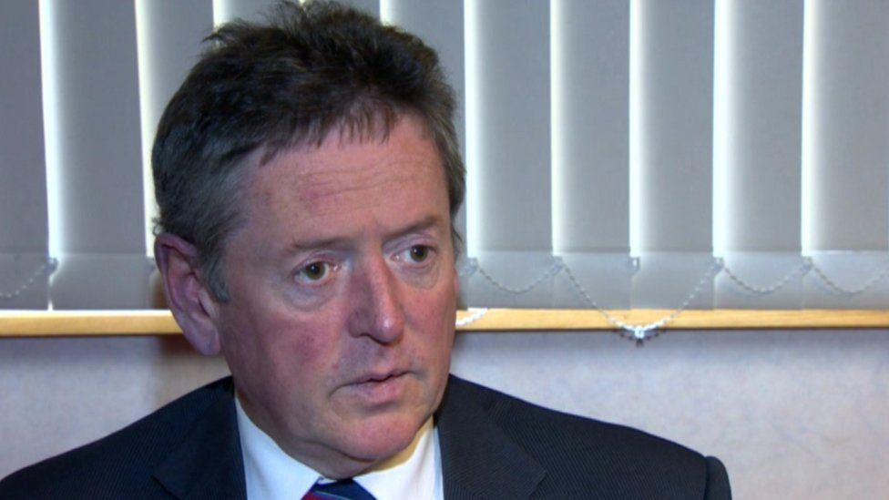 Reaction to NI health trust savings plans - BBC News