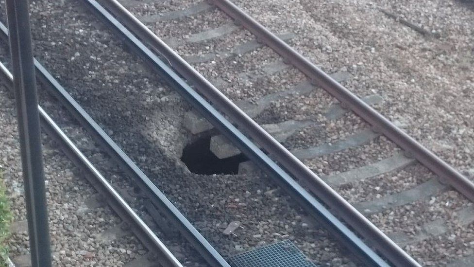 Trains cancelled due to 'hole above sewer' in Forest Hill - BBC News