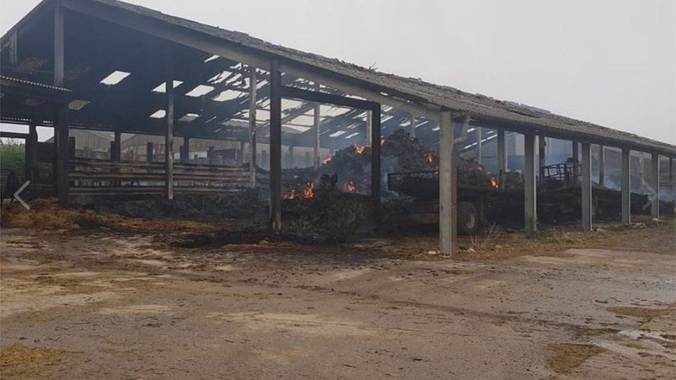 Arson probe after fire rips through barn in Marnhull - BBC News