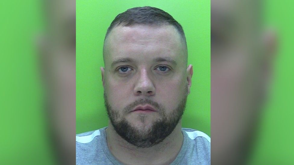 Mansfield Town fan jailed and banned over monkey noises at match - BBC News