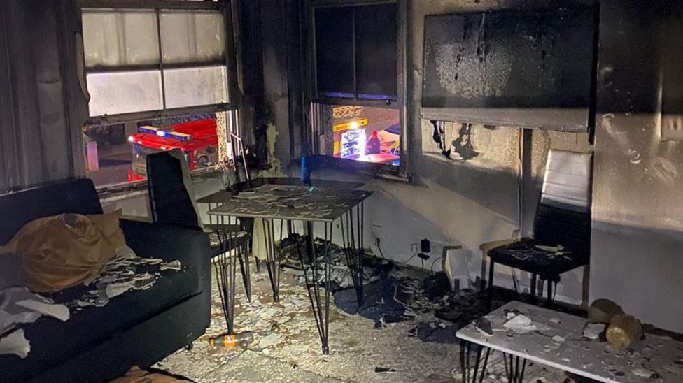 Basildon bedroom fire caused by overheated phone charger - BBC News