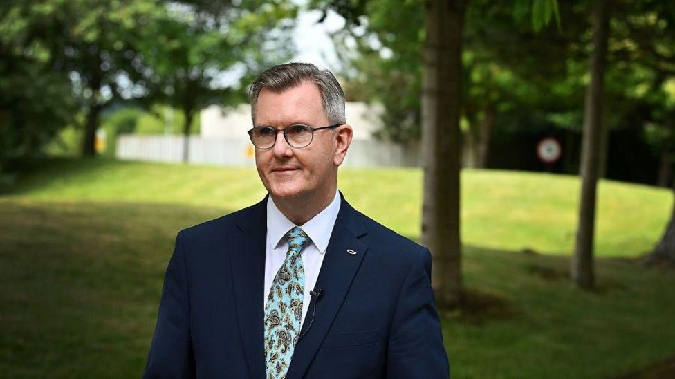 Jeffrey Donaldson sent for trial on sex offence charges - BBC News