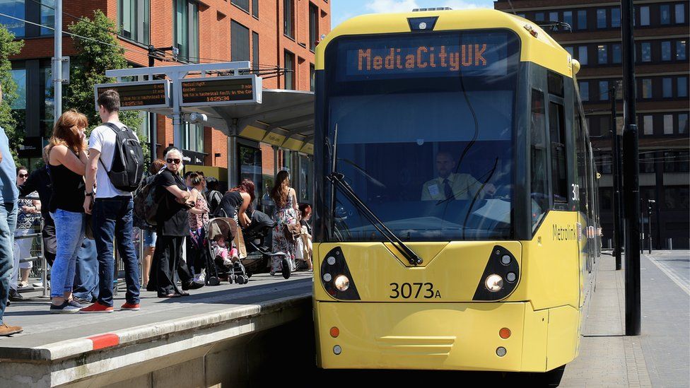 £165m Manchester tram line opens - BBC News