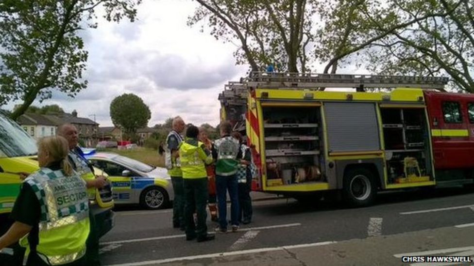 Two passengers trapped as bus hits tree in east London - BBC News