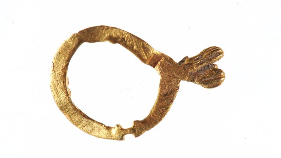 Brooch, arm ring and coins declared 'treasure' - BBC News