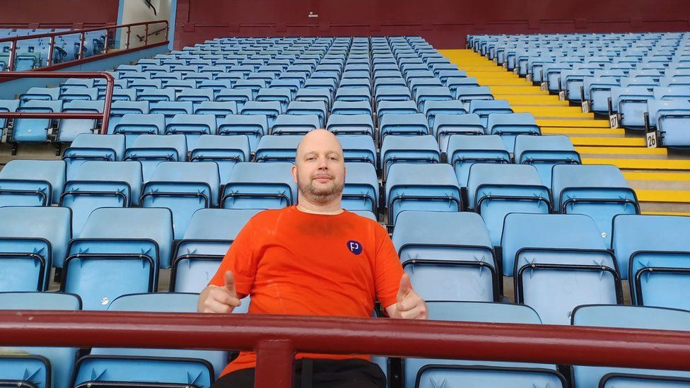 Man sits on every seat at Villa Park in charity challenge - BBC News
