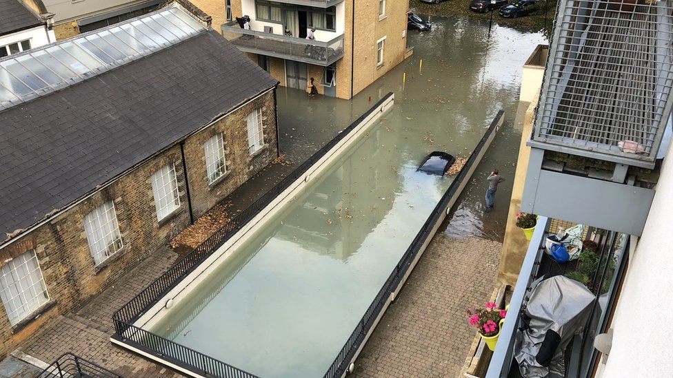 Burst Hackney underground car park pipe causes floods - BBC News