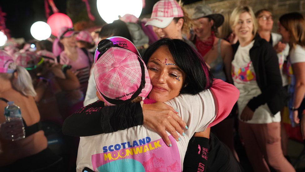 Colourful bras light up Edinburgh for Scotland MoonWalk - BBC News