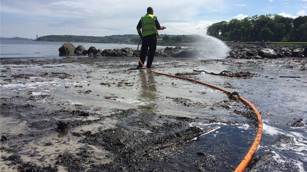 Caterpillar fined £7,500 for Larne diesel spill - BBC News