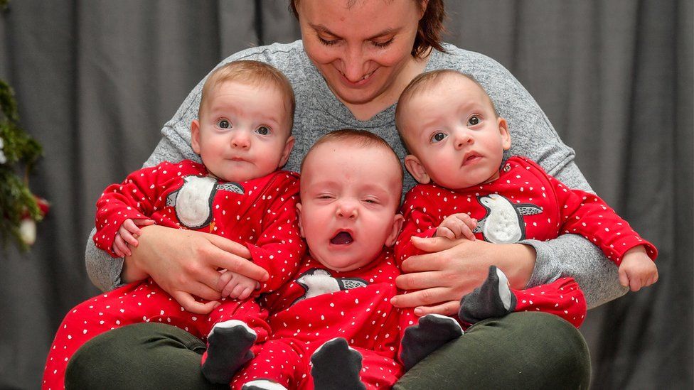 Cirencester triplets celebrate first Christmas at home - BBC News