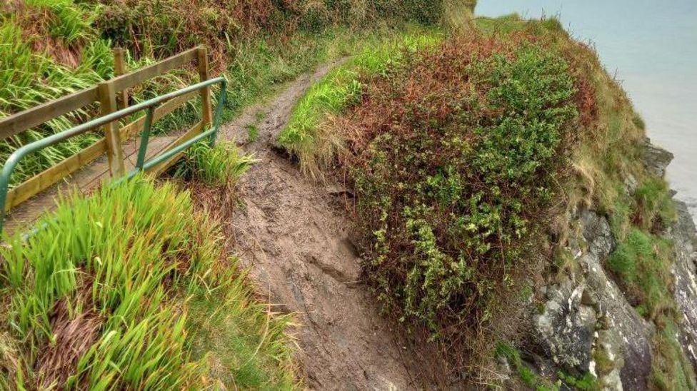 Footpaths shut as rain causes landslides in Laxey and Maughold - BBC News