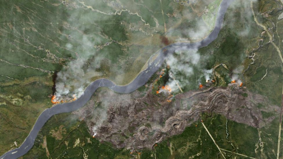 Nasa releases satellite pics of Fort McMurray wildfire - BBC Newsround