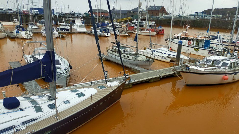 Hope and 'frustration' on Whitehaven Harbour's brown water - BBC News