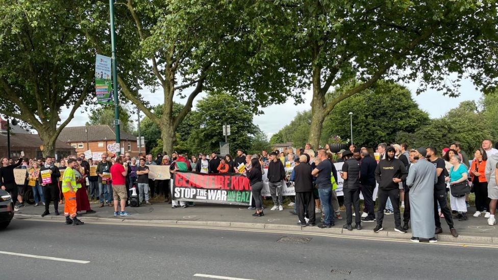 Derby protest sees crowds turn out to promote community - BBC News