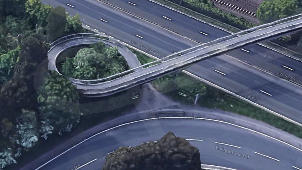 Car wedged between footbridge railings in Hessle - BBC News