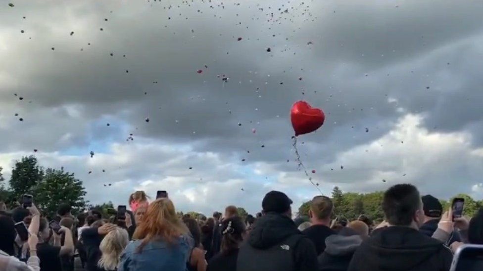 Balloon release in Katniss Seleznev's memory after hit-and-run - BBC News