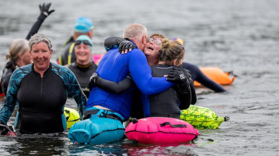 In pictures: The Highlands' Kessock Ferry Swim - BBC News