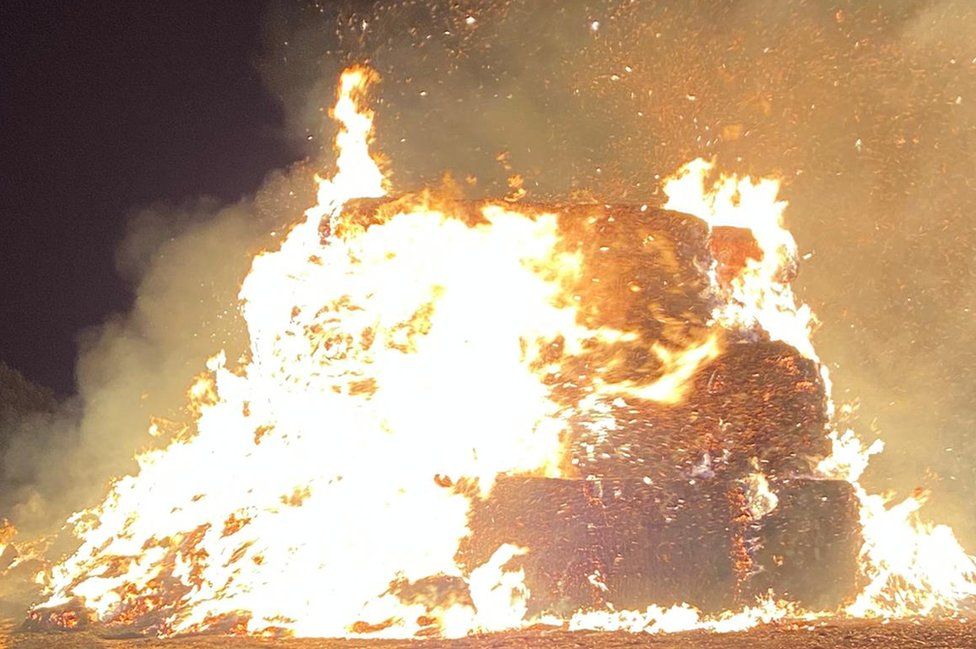 Firefighters tackle large Woodham Walter haystack fire - BBC News