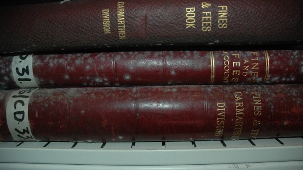 Historical items 'being destroyed' by mould in Carmarthen - BBC News