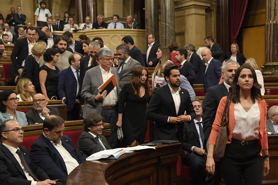 Catalonia parliament approves independence referendum - BBC News