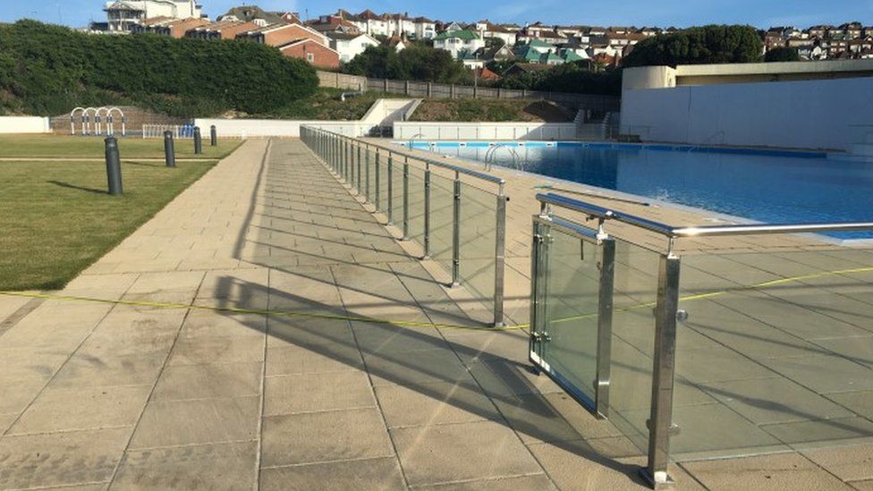 Saltdean Lido: Swimming pool reopens after seven-year revamp - BBC News