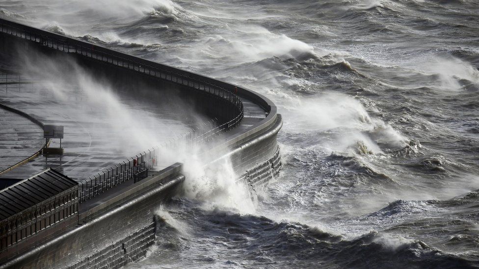 Folkestone's storm-damaged sea wall repaired - BBC News