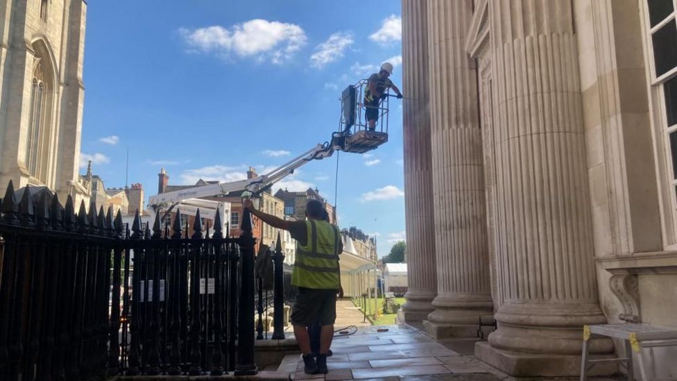 University of Cambridge building cleaned after protesters spray paint ...