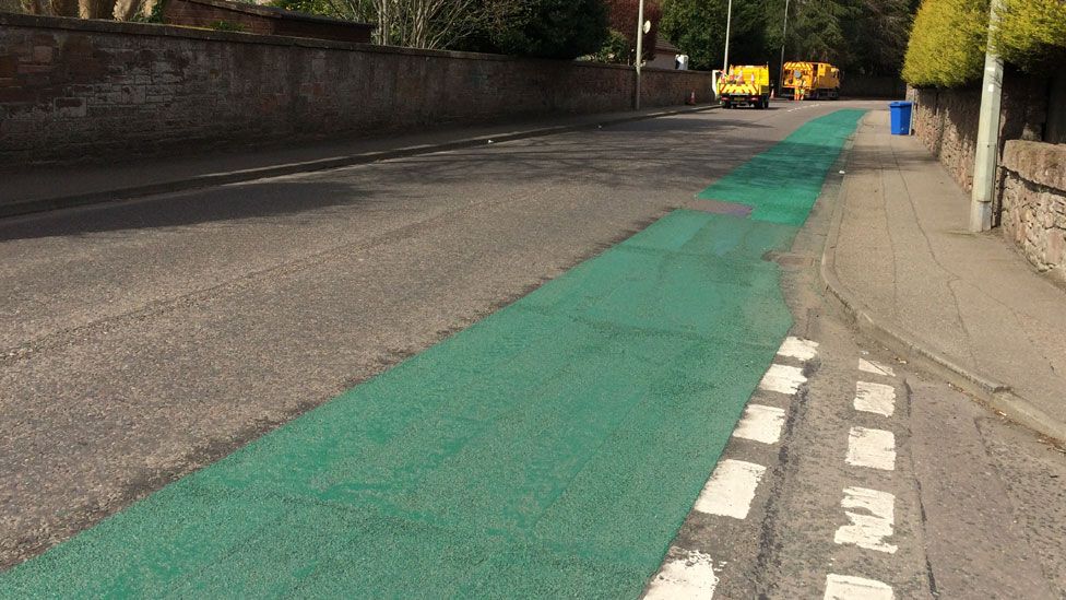 Why roads in Inverness are being painted green - BBC News
