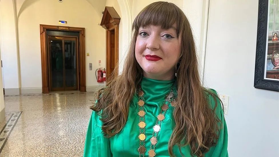 Belfast City Council: Less severe cut for charity after row - BBC News