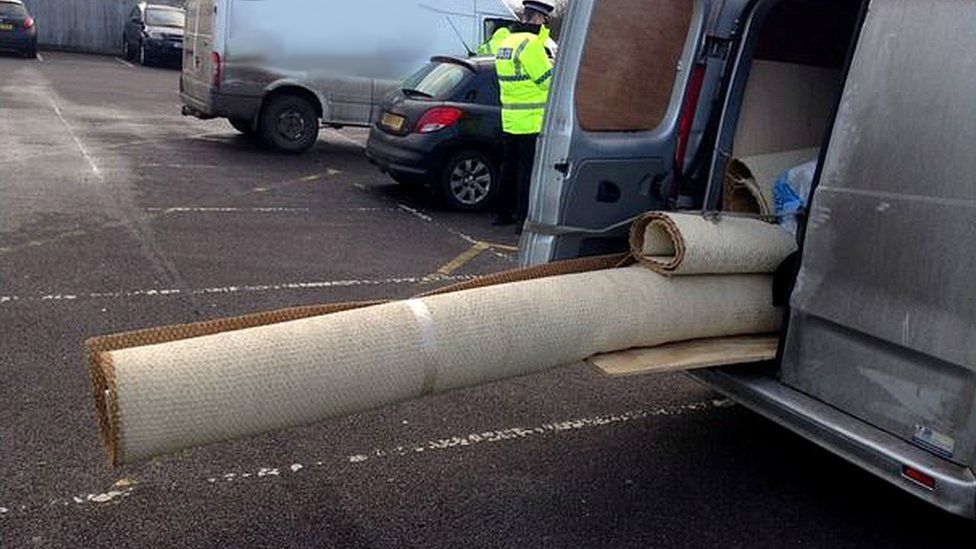 Hertfordshire Police officer unamused at carpet caper - BBC News